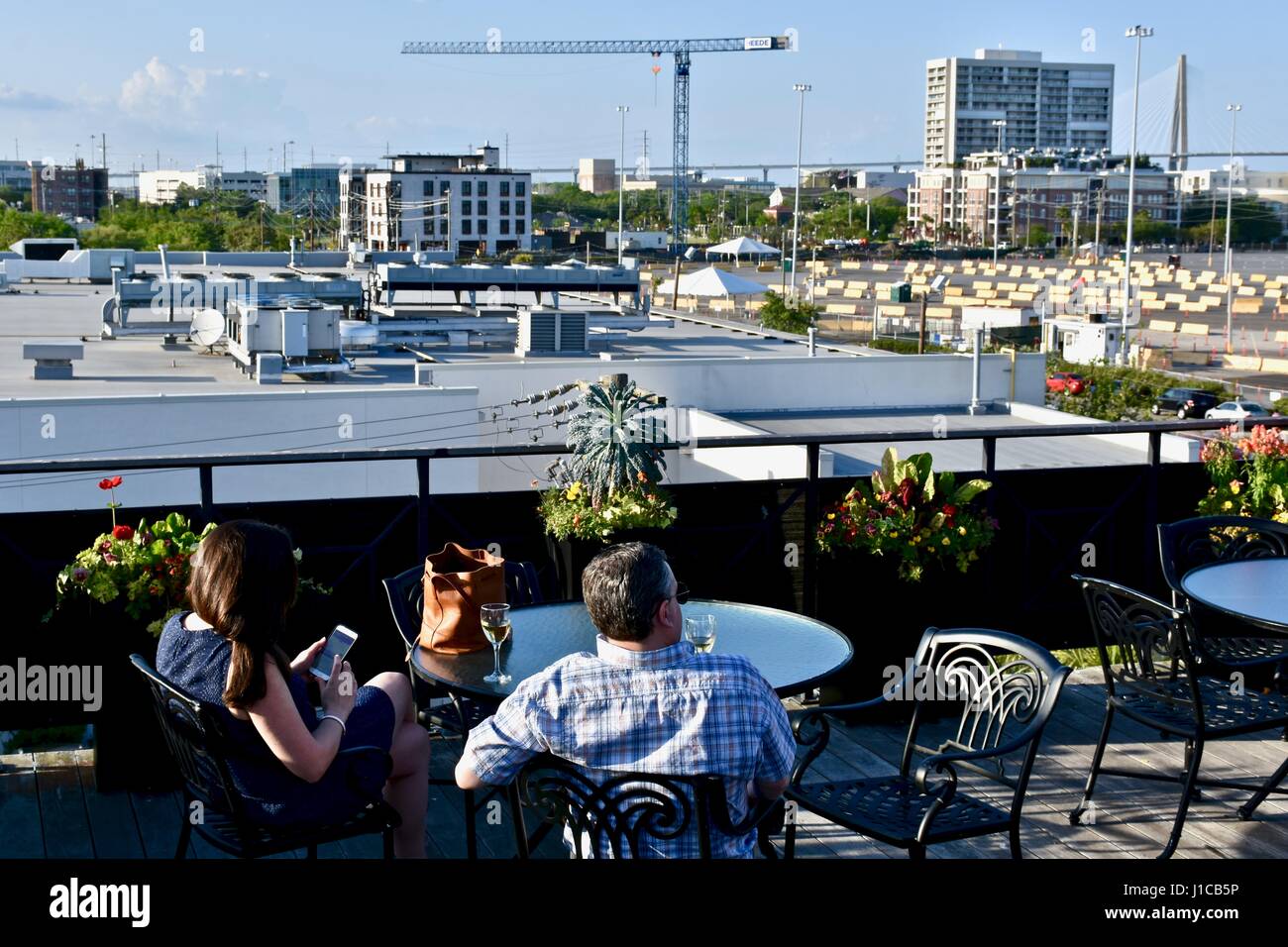 Rooftop terrace with view of historic Charleston at the Ansonborough ...