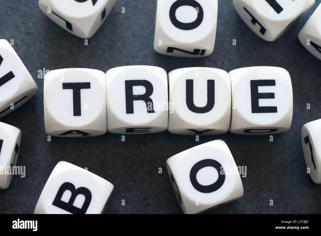 word true on white toy cubes Stock Photo - Alamy