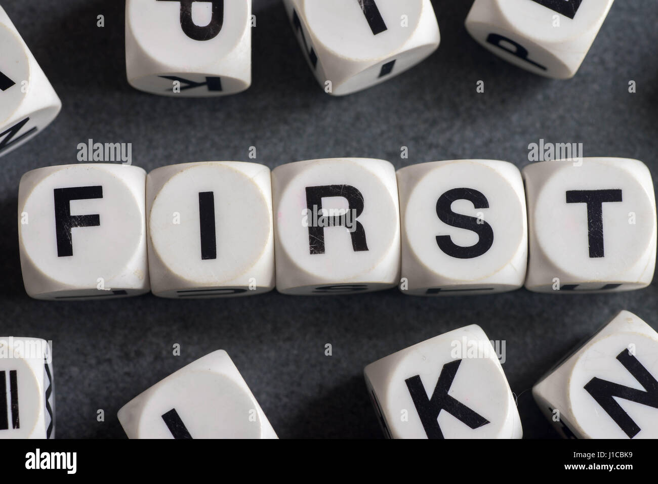 word first on white toy cubes Stock Photo - Alamy