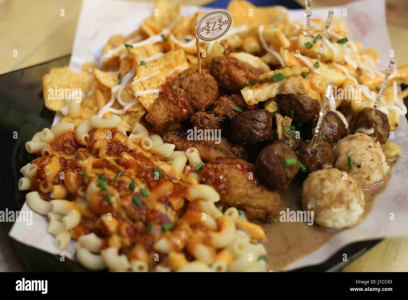 Meatball Macaroni Nachos Combo Stock Photo - Alamy