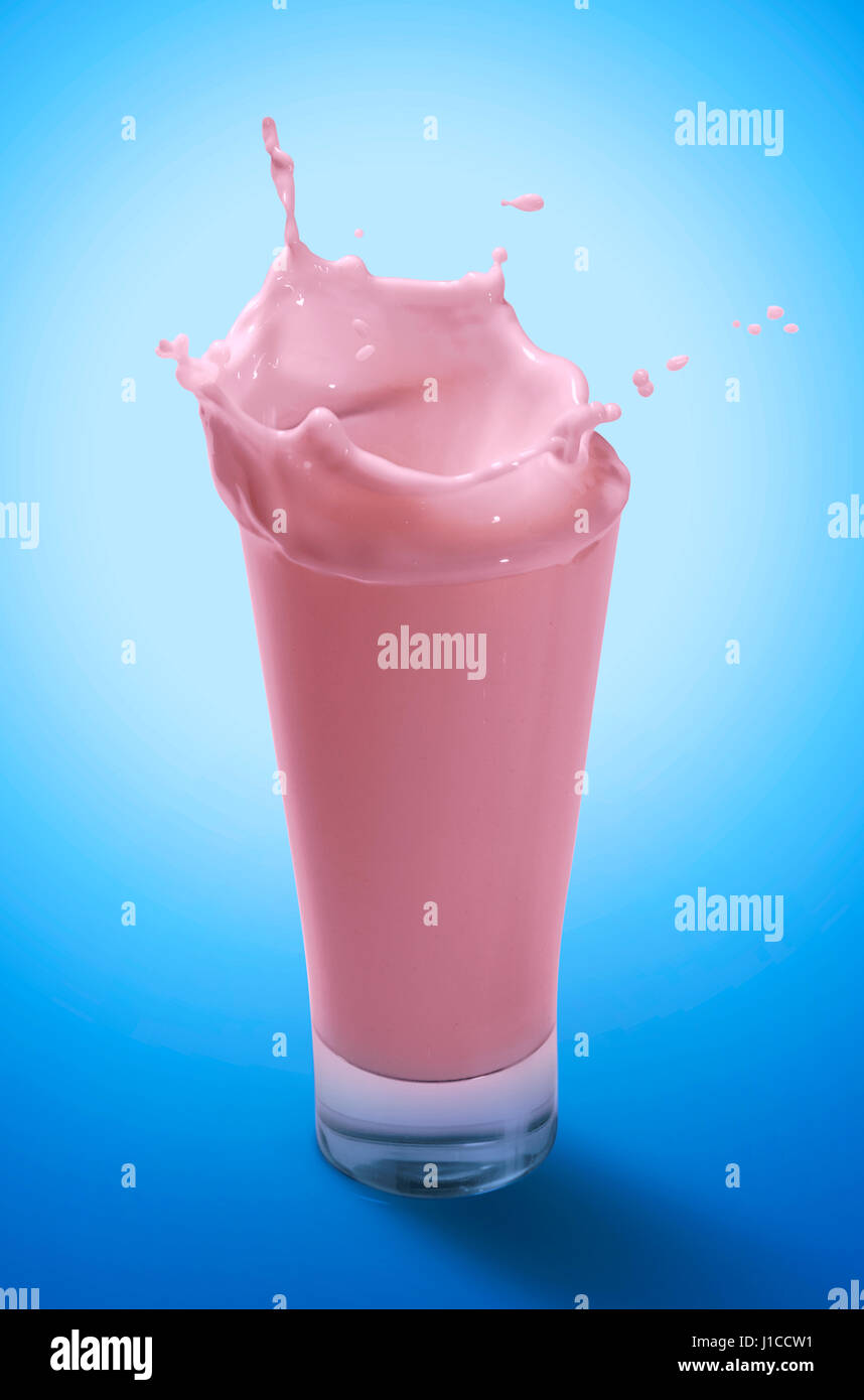 Splash of Pouring Strawberry Milkshake in A Glass Stock Photo - Alamy