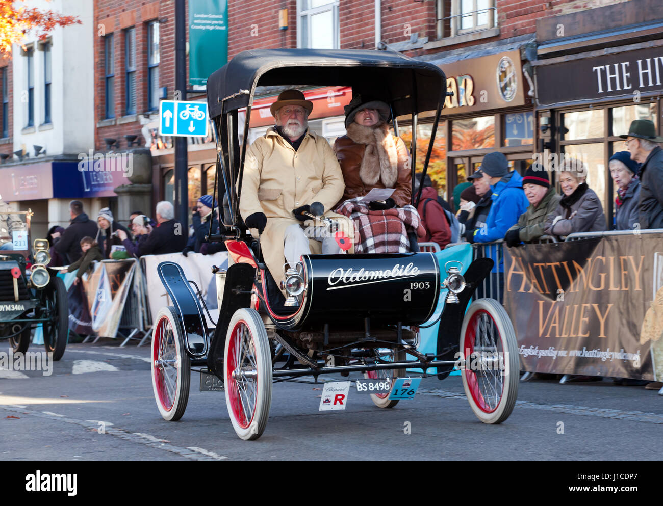 A 1903 Oldsmobile, driven by Mr Mr David Laughton, passes through ...