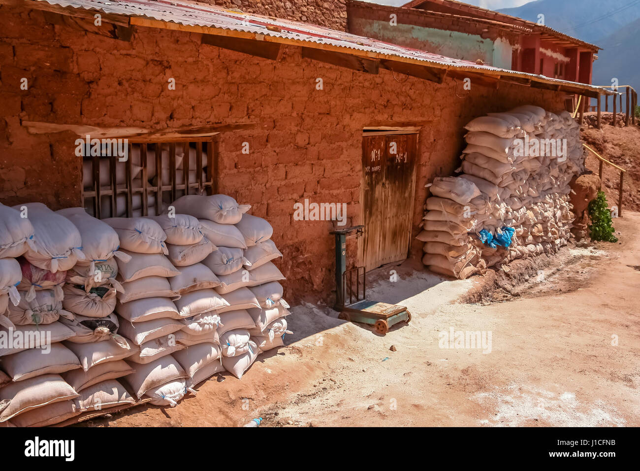 Bags of salt ready for collection from the traditional salt mine ...