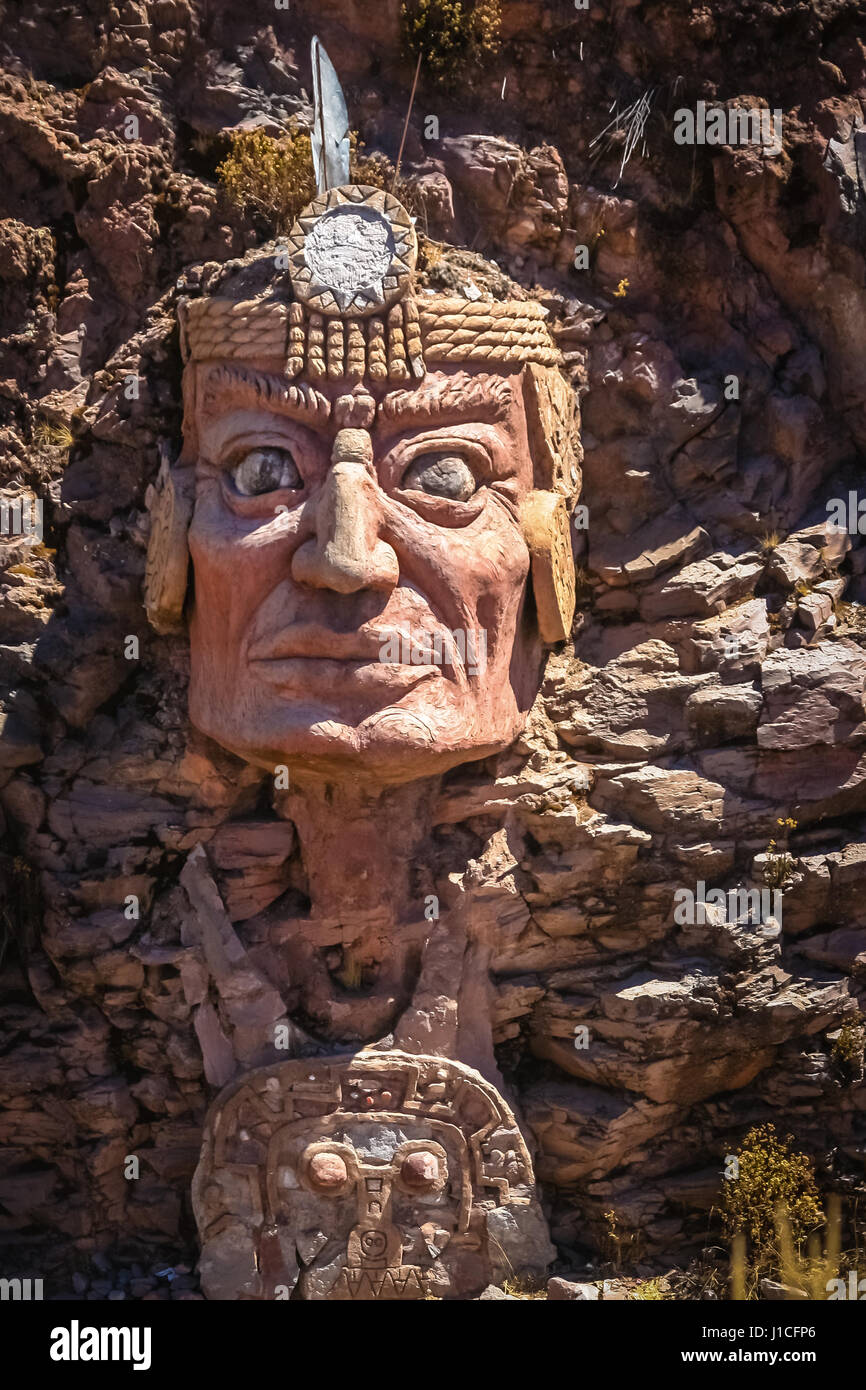 Stone Inca face sculpture on the shore of Lake Titicaca in Peru Stock ...