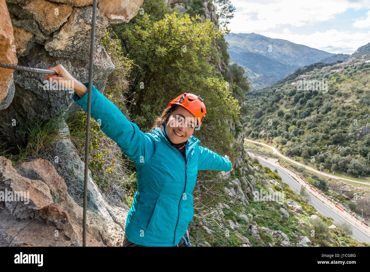 Woman climbing ladder hi-res stock photography and images - Alamy