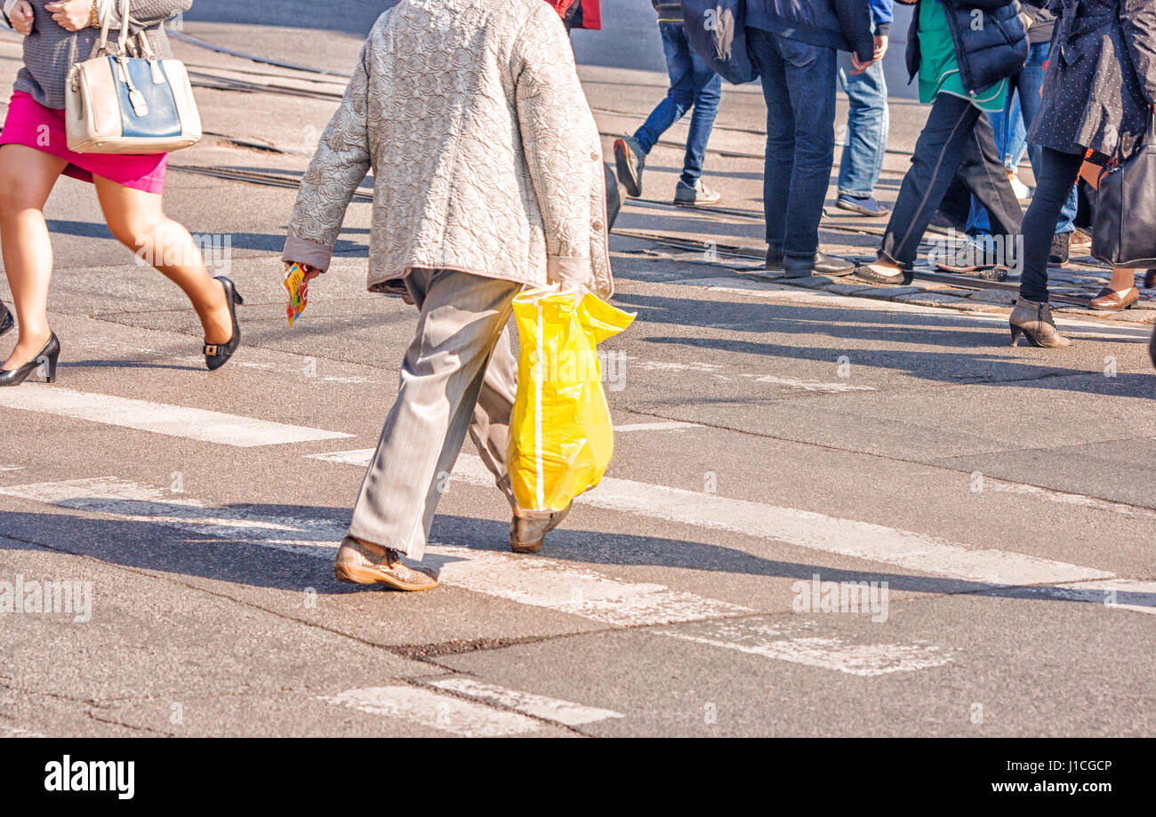 road crossing with women, pedestrian feet on sunny spring day Stock ...