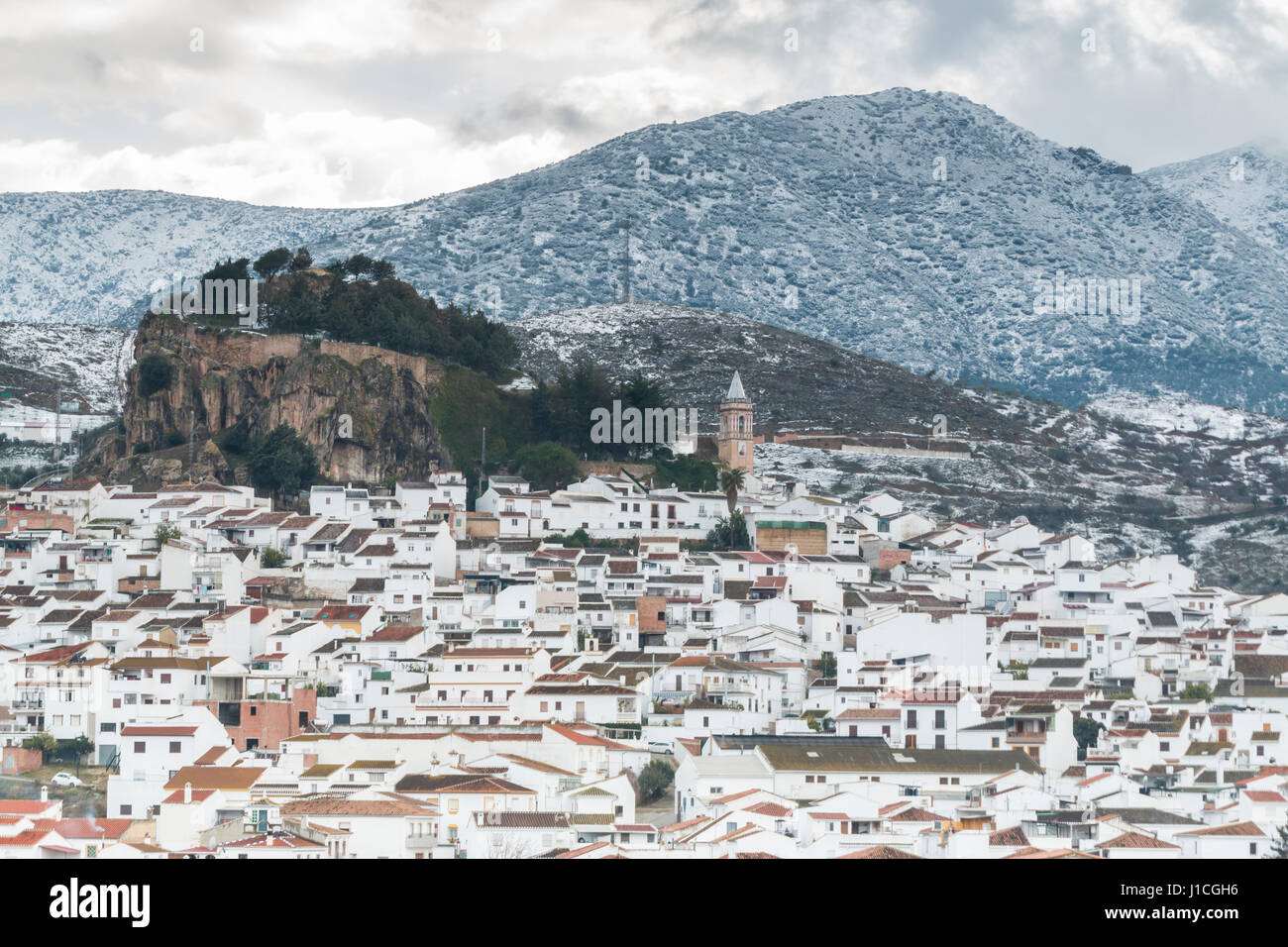 View to the beautiful town placed in the mountains in cloudy day ...