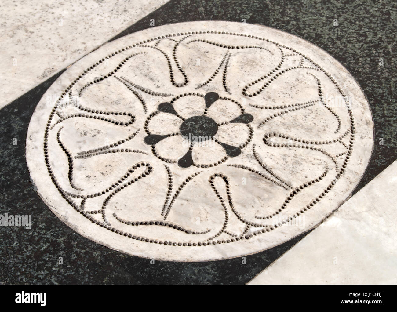 Marble pavement outside of Duomo di Siena. The Siena Cathedral is today ...