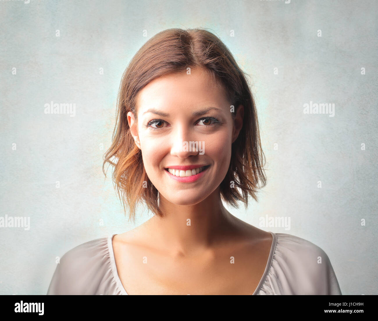 Portrait of a cute girl smiling Stock Photo - Alamy
