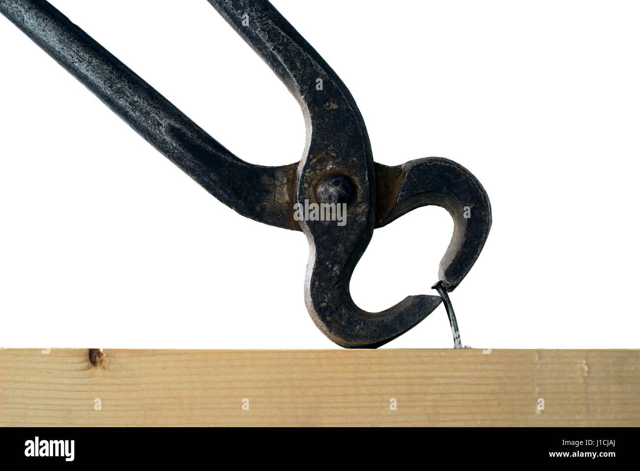 Pincers pulling out nail. Isolated Stock Photo Alamy
