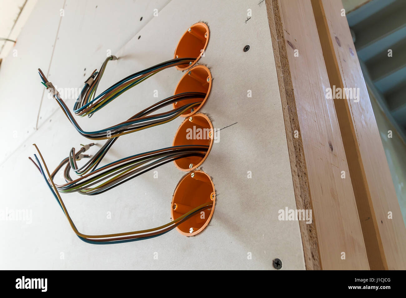 New electrical installation, socket plastic boxes and electrical cables ...