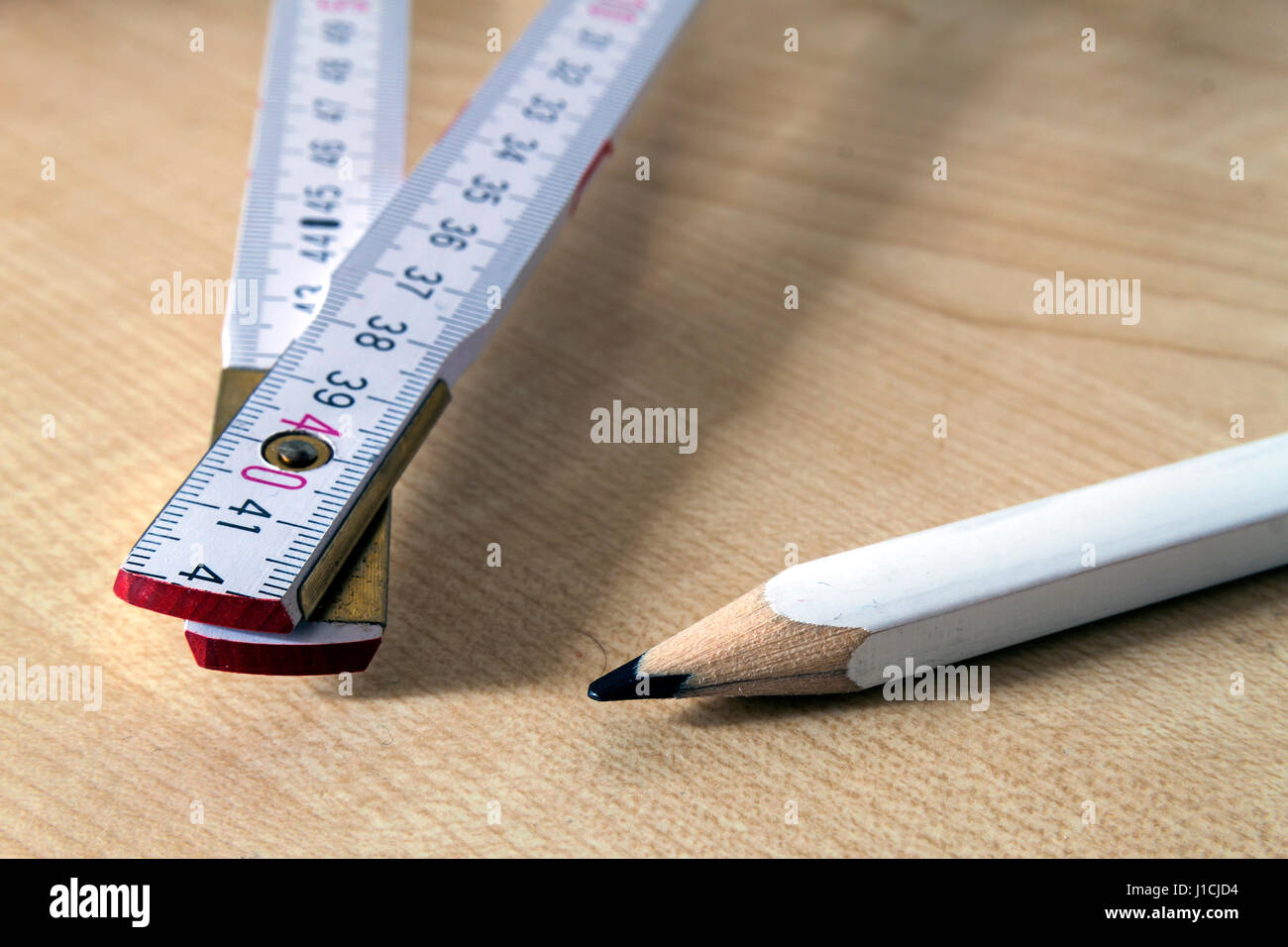 Measuring tape meter and pensil. Construction tools Stock Photo - Alamy