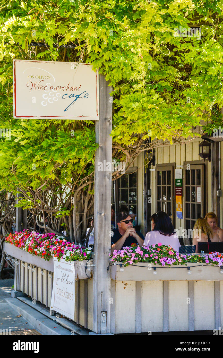 People enjoy the outdoor patio dining at the Los Olivos Wine merchant ...