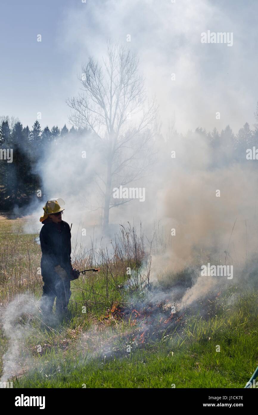 Person burning field in hi-res stock photography and images - Alamy