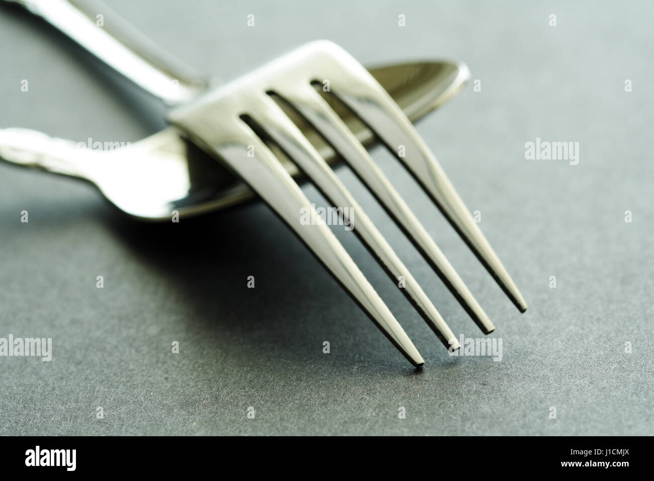 A close up of spoon and fork Stock Photo - Alamy