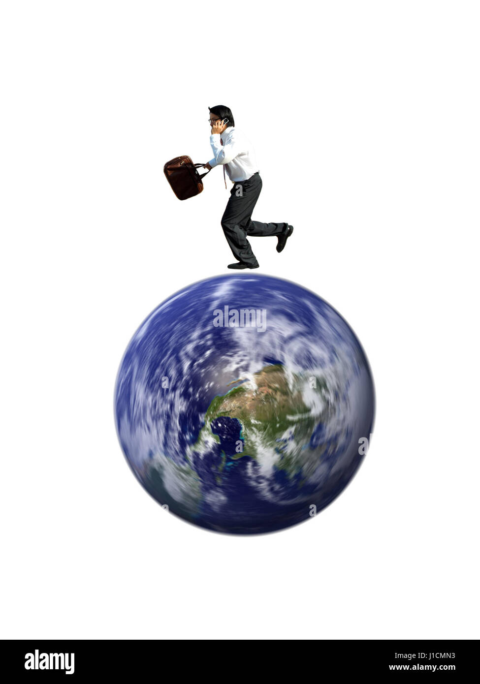 A businessman talking on the phone and running on a spinning globe (the ...