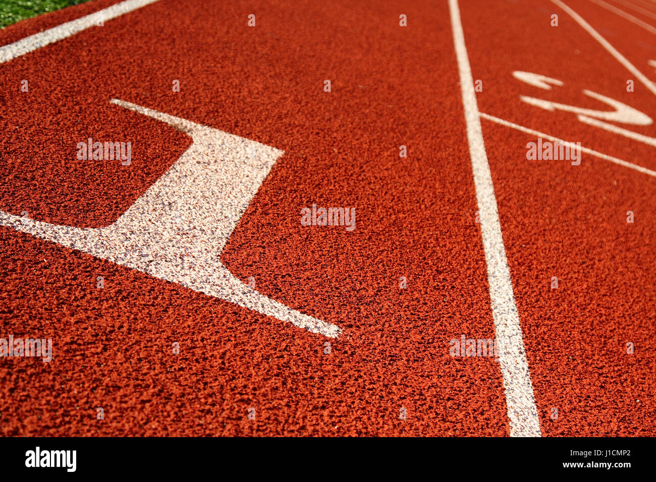 A shot of a running track on an athletic field Stock Photo - Alamy