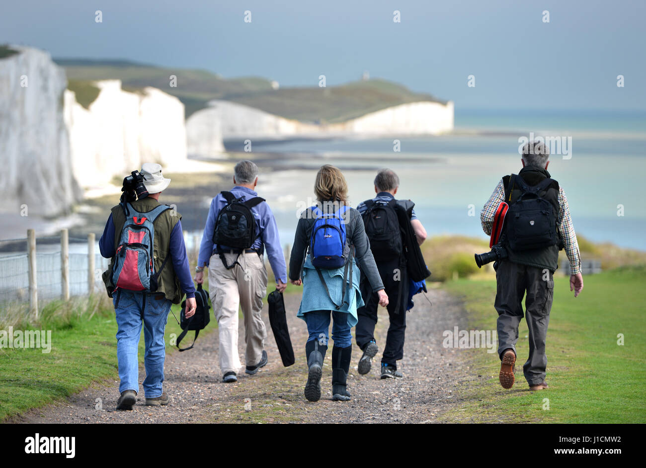 Group of walkers/photographers near the iconic Seven Sisters chalk ...