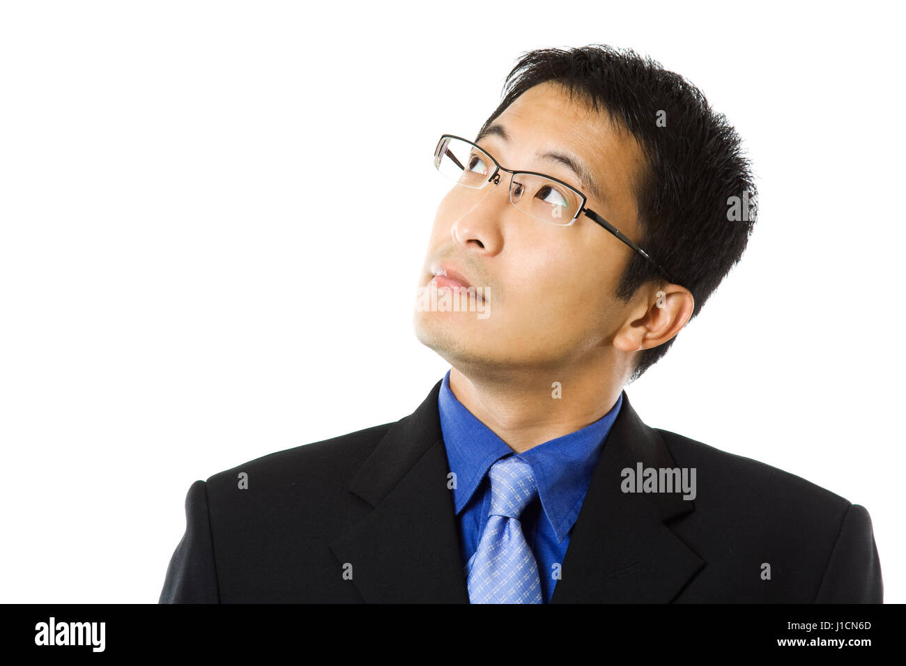 An isolated shot of a businessman looking up Stock Photo - Alamy
