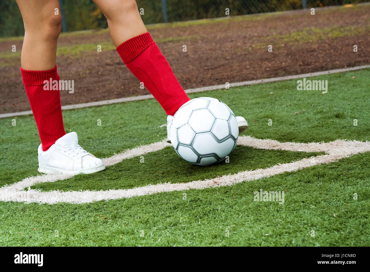 A closeup shot of a female soccer player taking a corner kick Stock ...