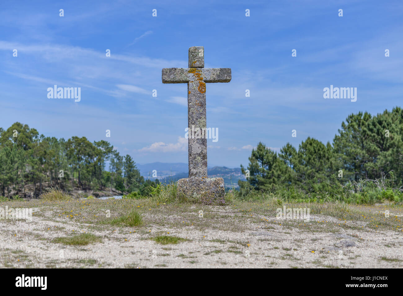Stone Cross on nature Stock Photo - Alamy