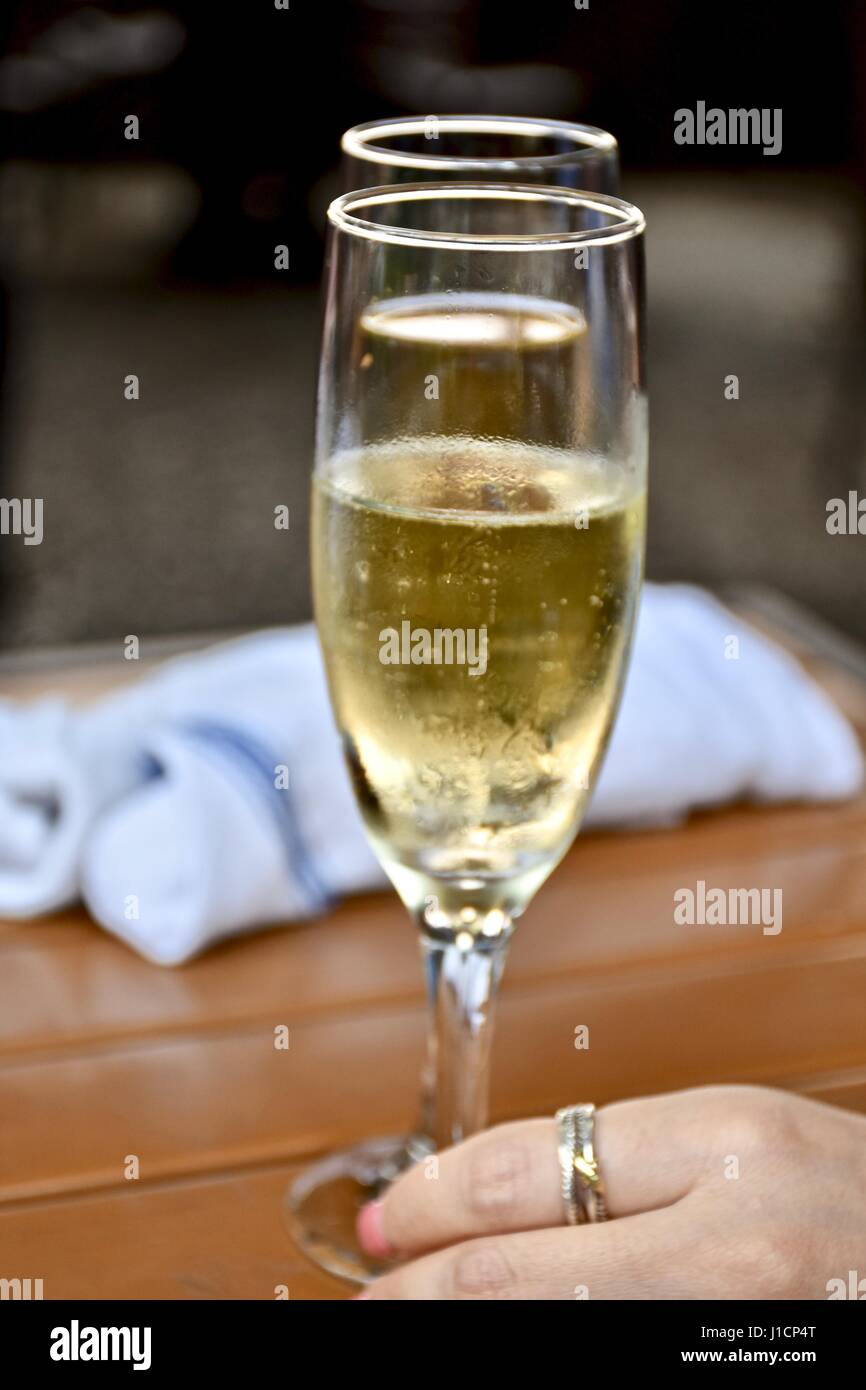 Champagne in hand hi-res stock photography and images - Alamy