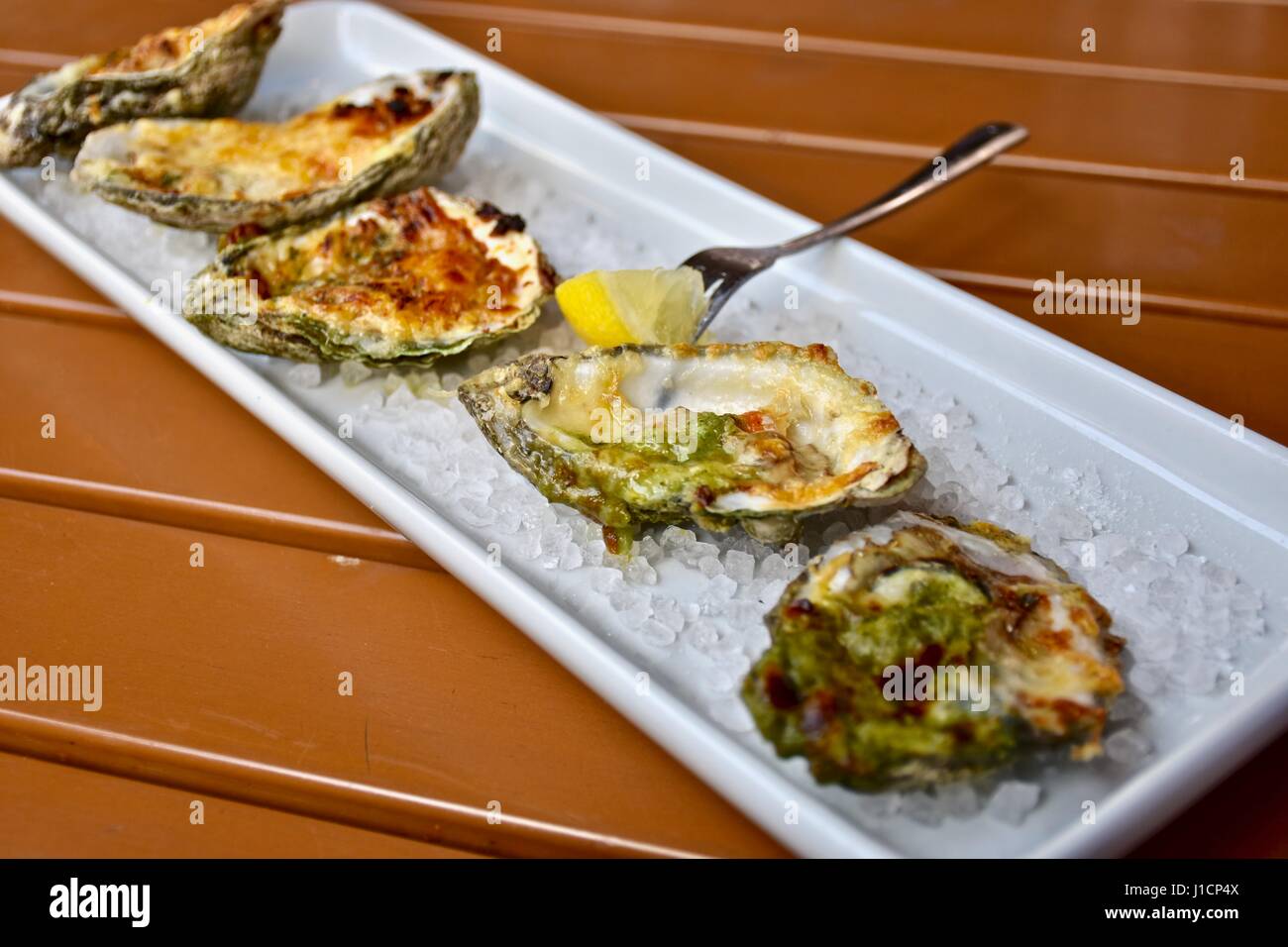 Half oysters shell hi-res stock photography and images - Alamy