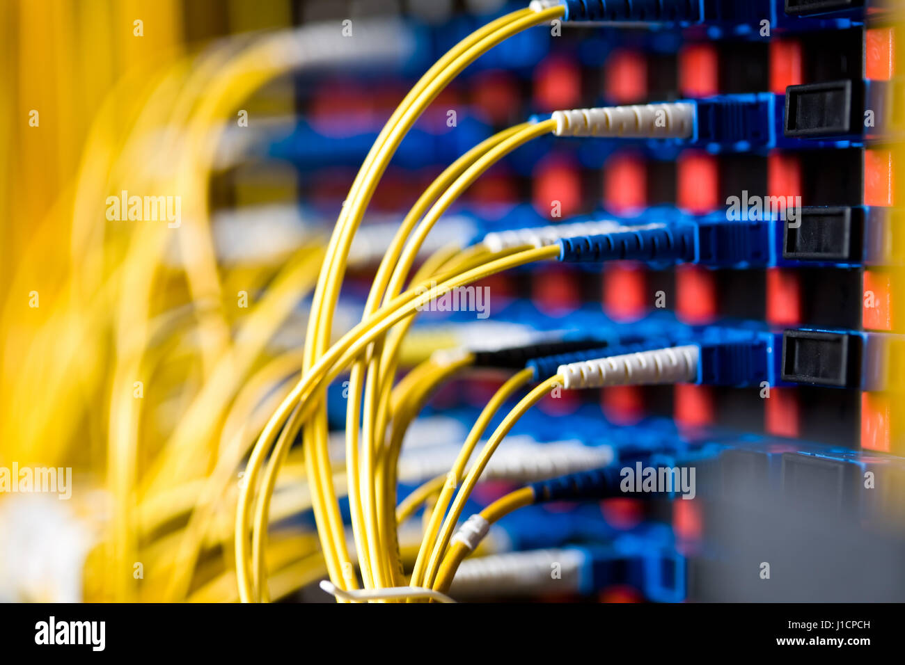 A shot of network cables connected to switch Stock Photo - Alamy