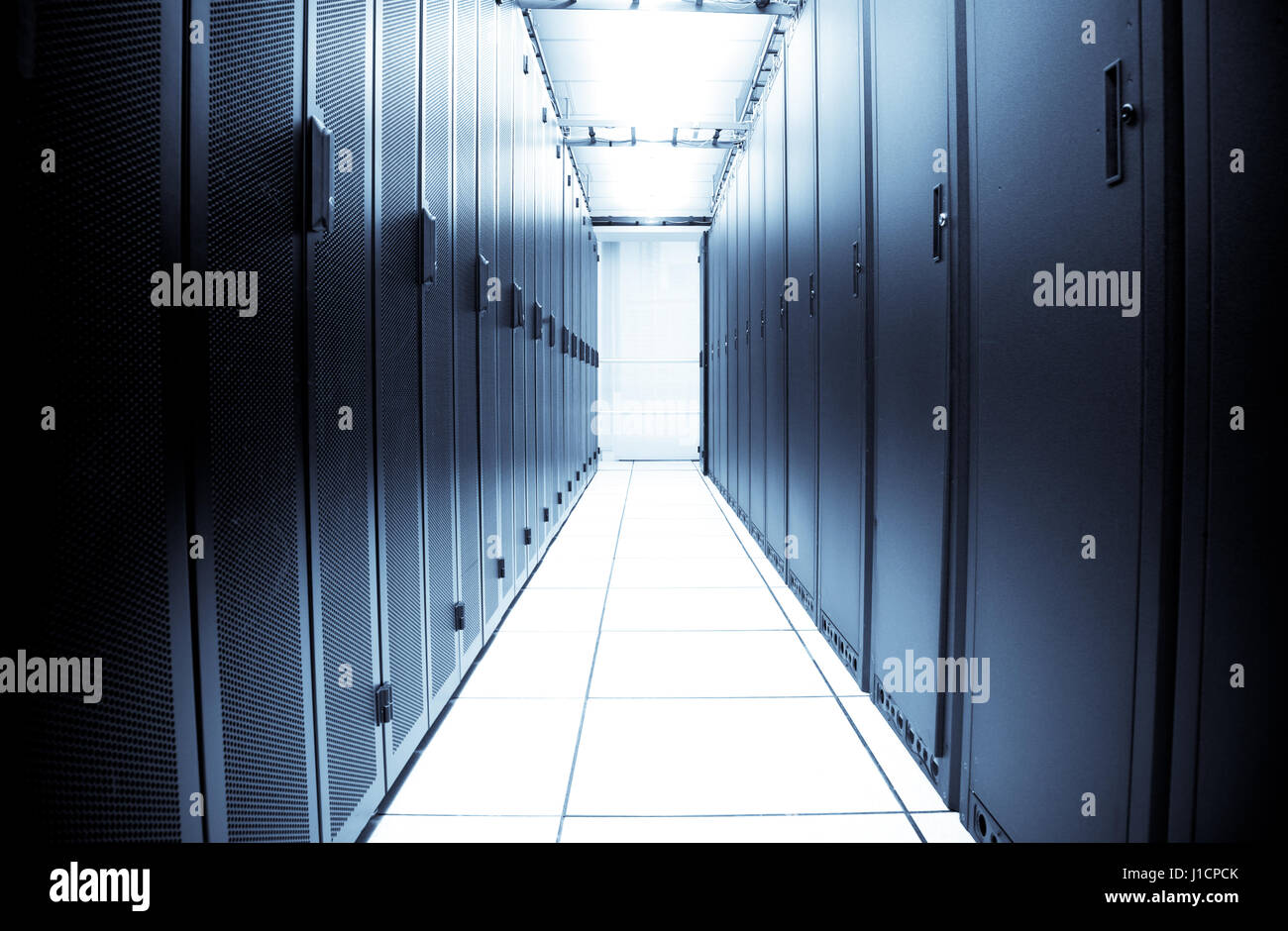 An interior shot of a computer data center (in blue tone Stock Photo ...
