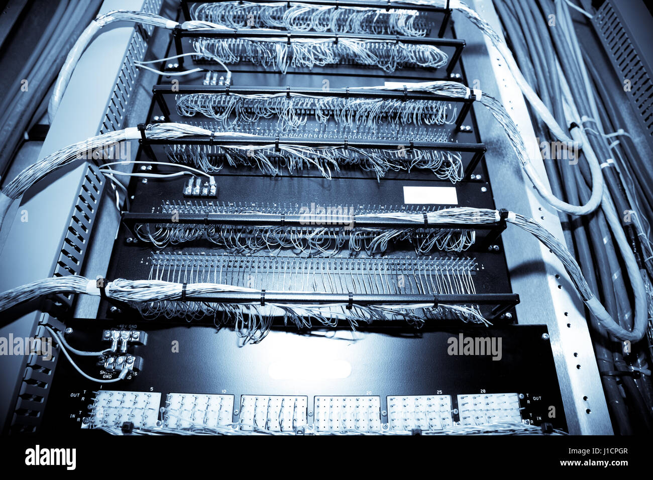 A shot of network equipment in a data center (in blue tone Stock Photo ...