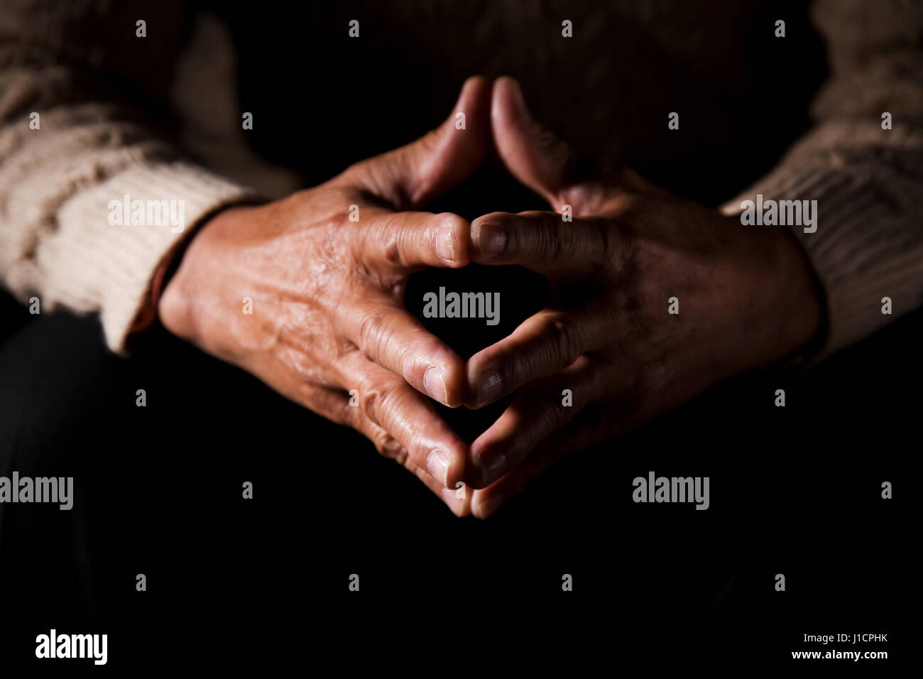 Closeup shot wrinkled hands hi-res stock photography and images - Alamy