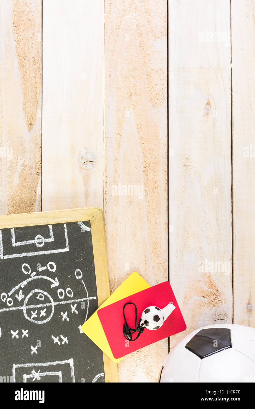 Chalk game plan board and soccer ball on a wood table Stock Photo - Alamy
