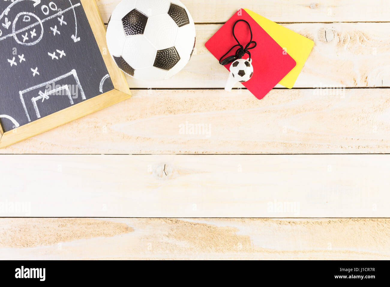 Chalk game plan board and soccer ball on a wood table Stock Photo - Alamy