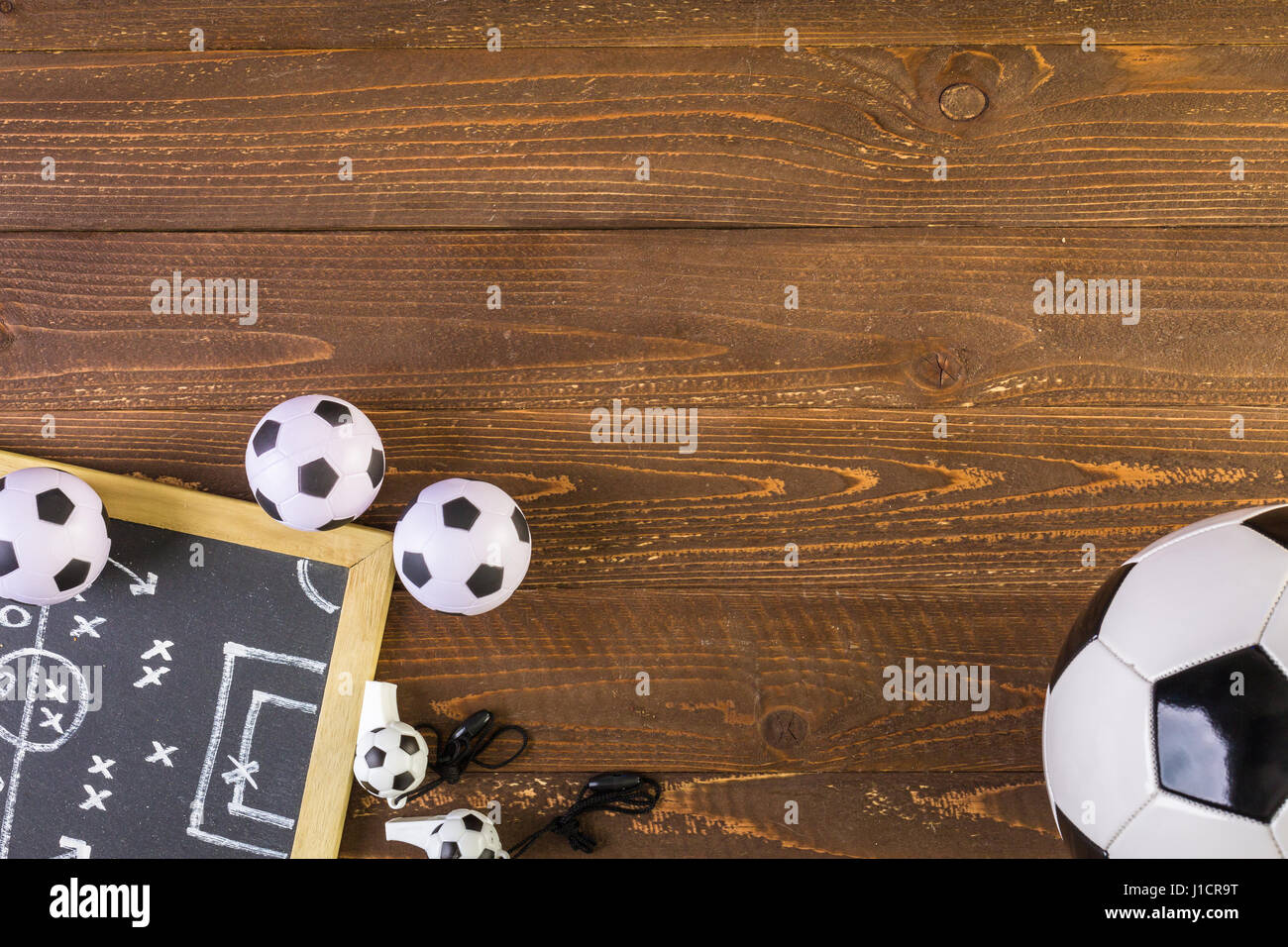 Chalk game plan board and soccer ball on a wood table Stock Photo - Alamy