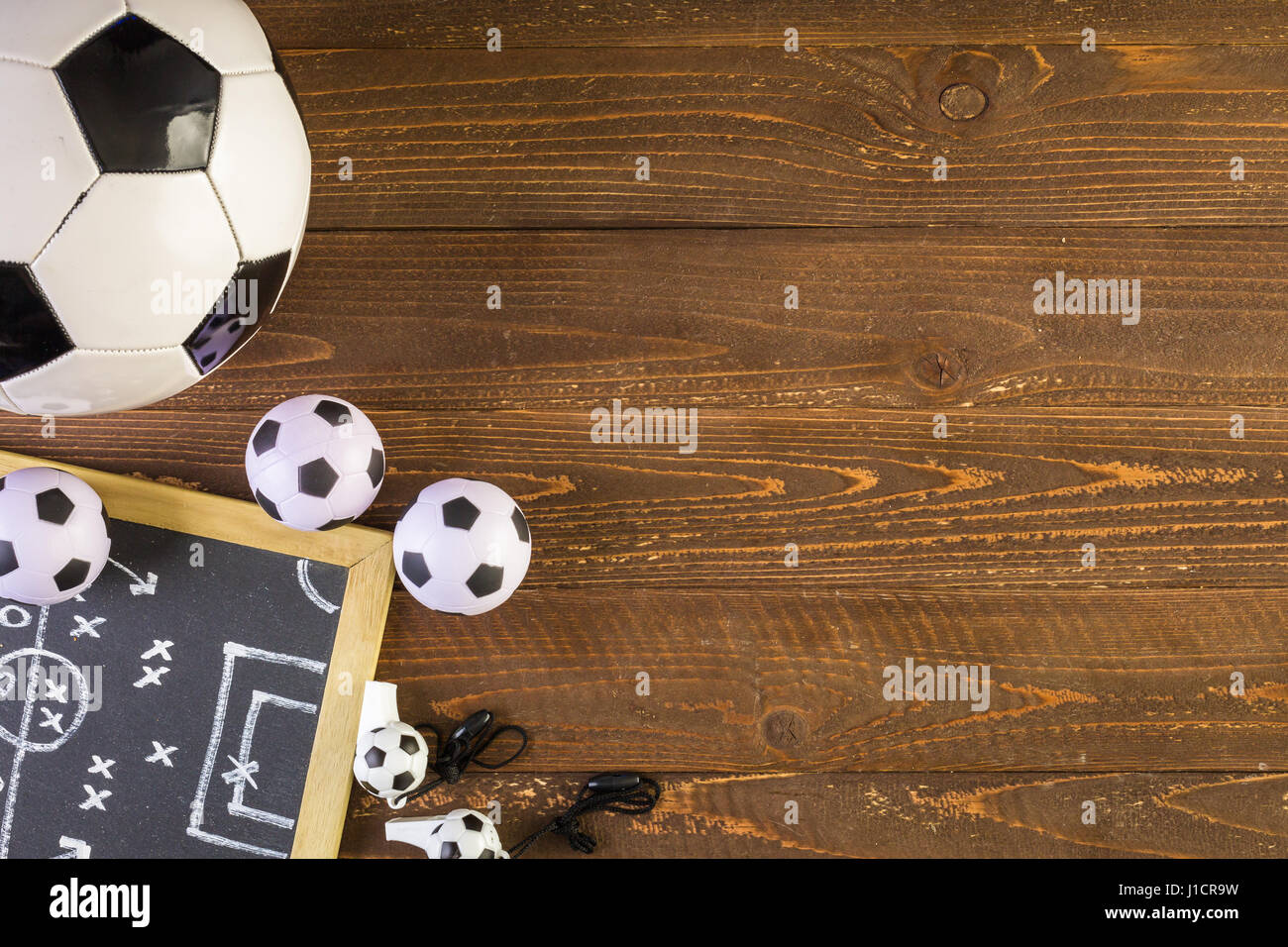 Chalk game plan board and soccer ball on a wood table Stock Photo - Alamy