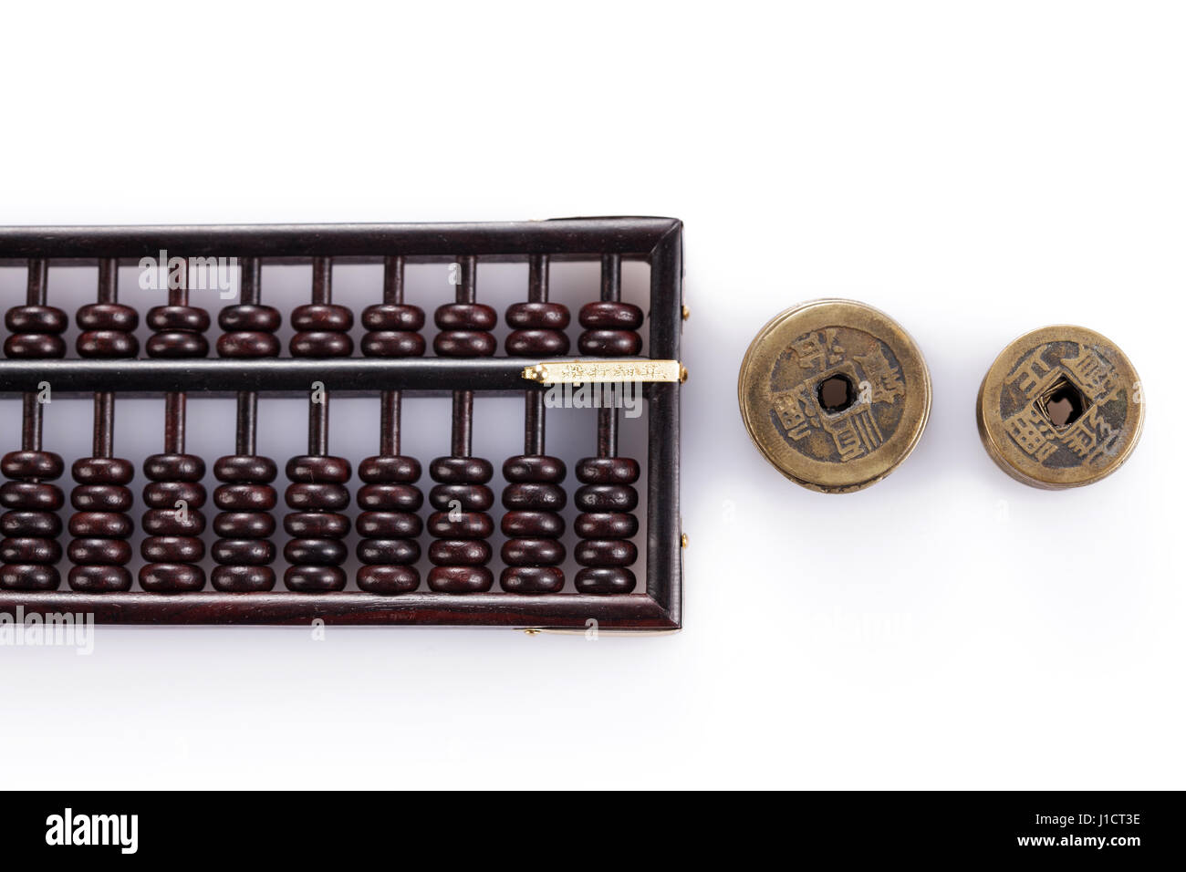 The abacus and coins Stock Photo - Alamy