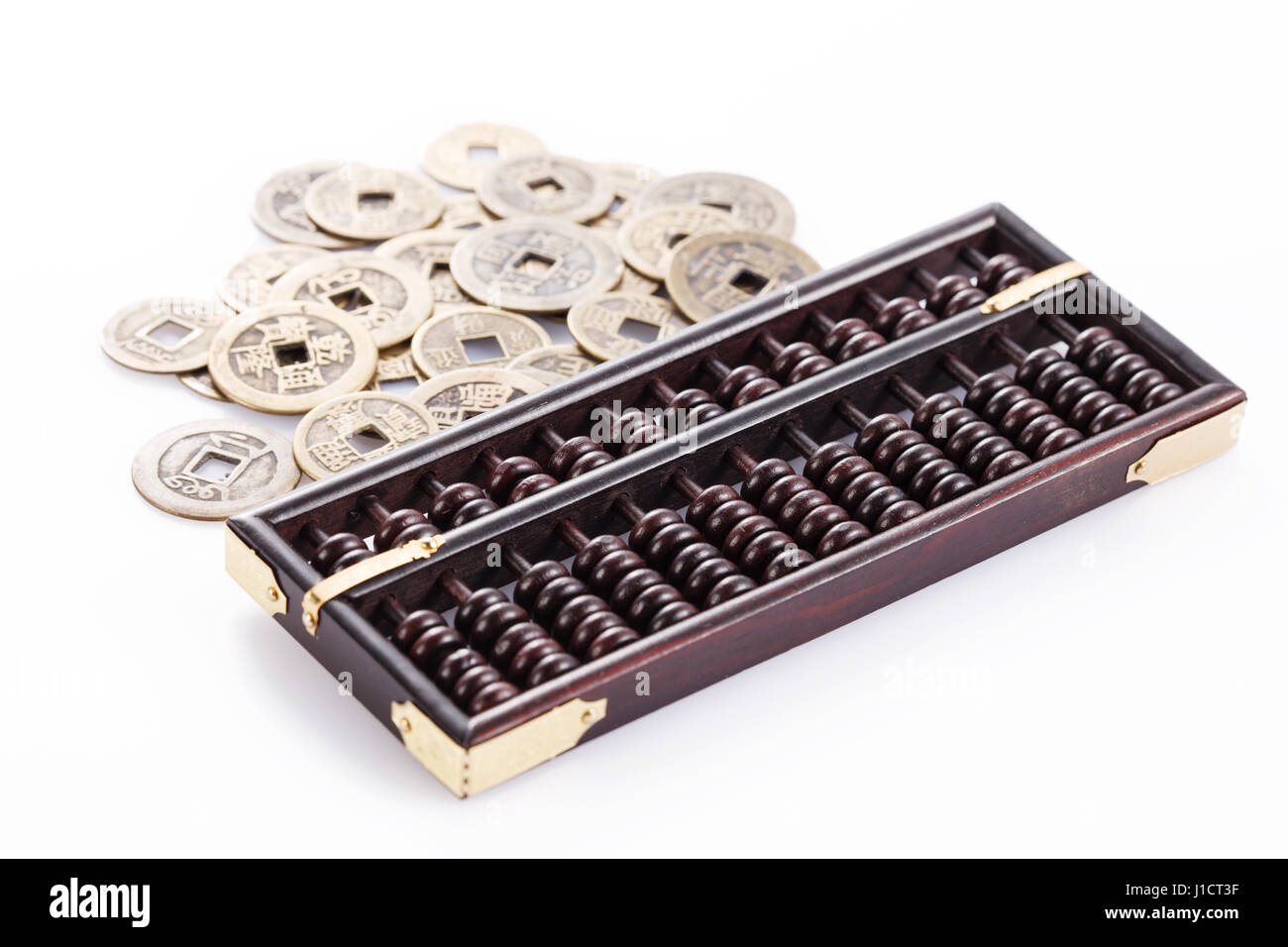 The abacus and coins Stock Photo - Alamy