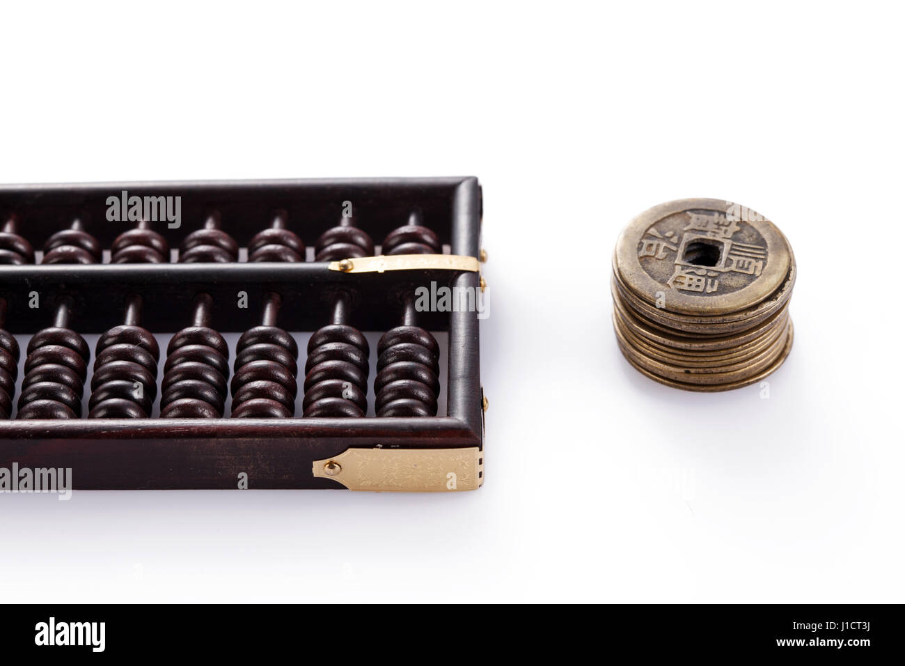 The abacus and coins Stock Photo - Alamy