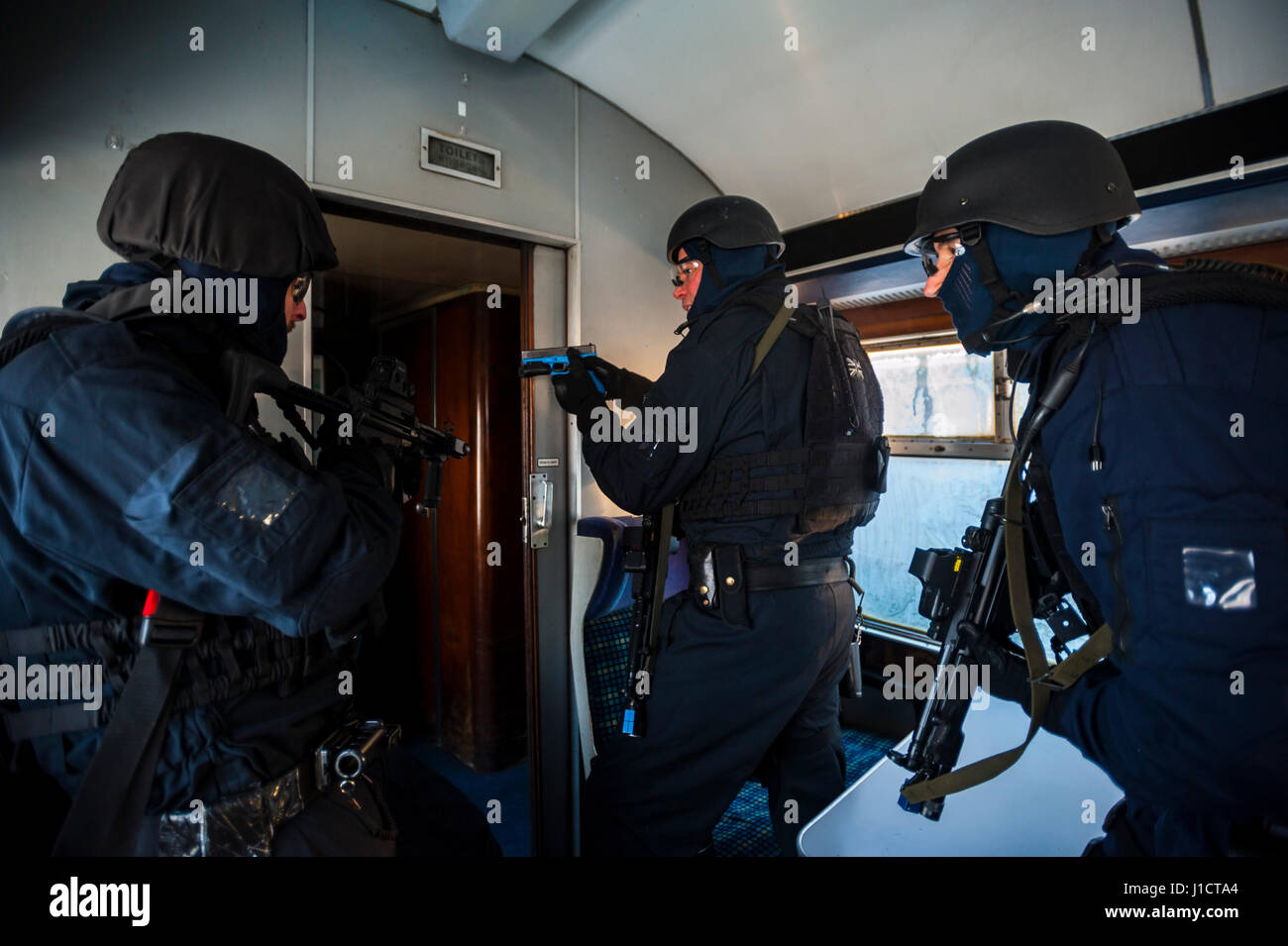 British armed police officers firearms exercise where they storm a ...
