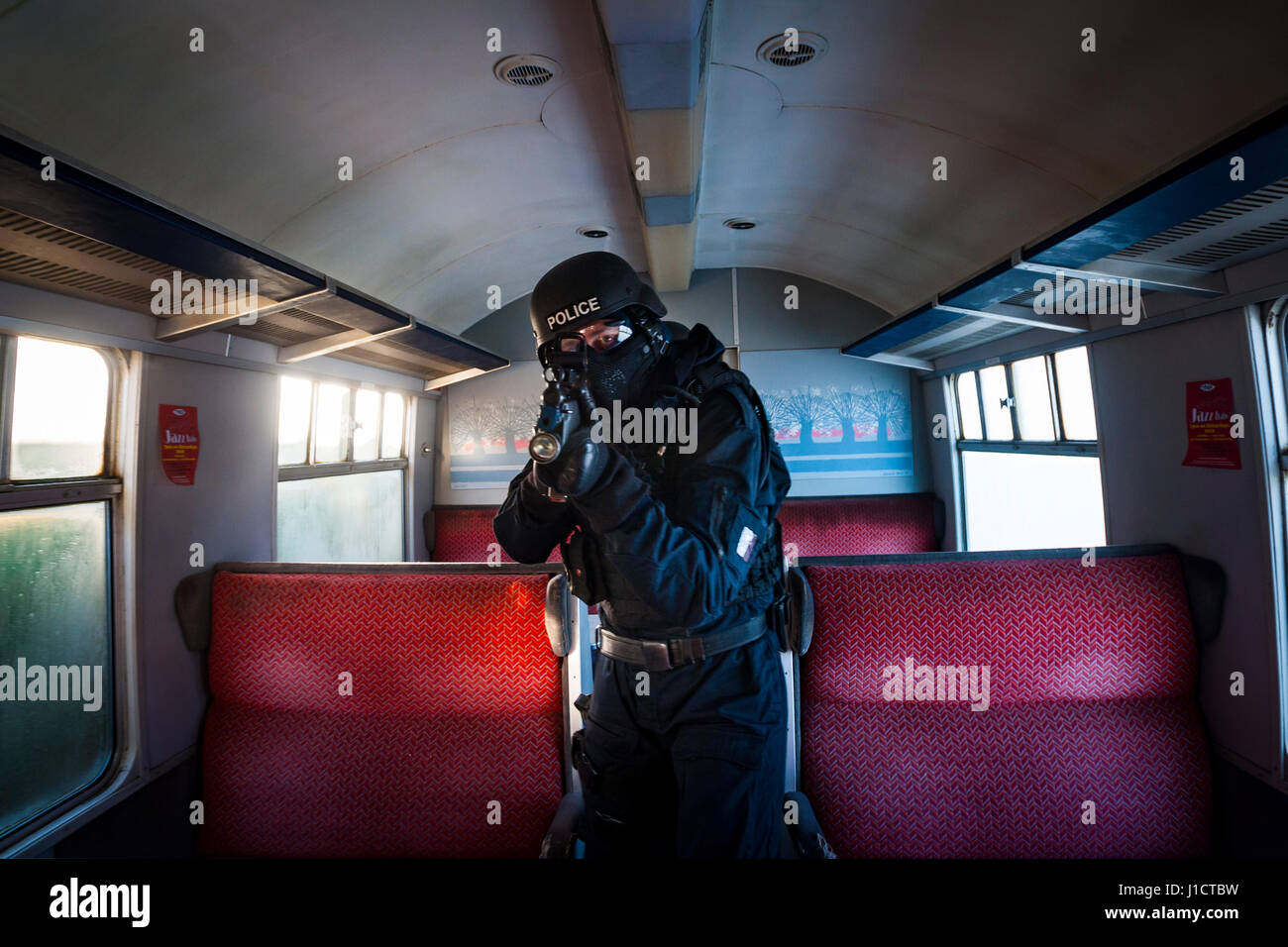 British armed police officers firearms exercise where they storm a ...