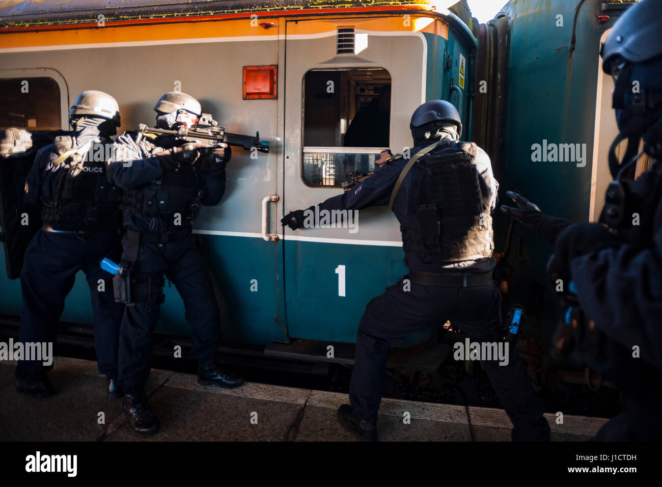 British armed police officers firearms exercise where they storm a ...
