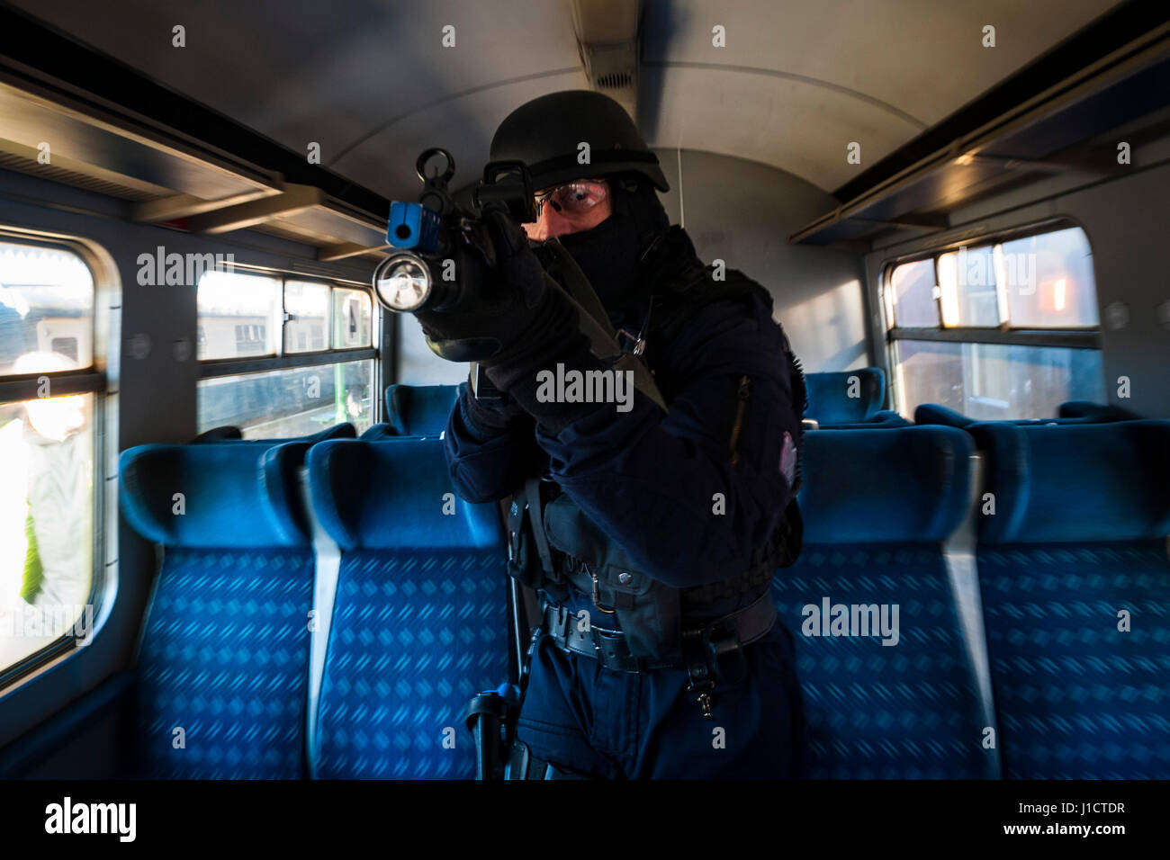 British armed police officers firearms exercise where they storm a ...