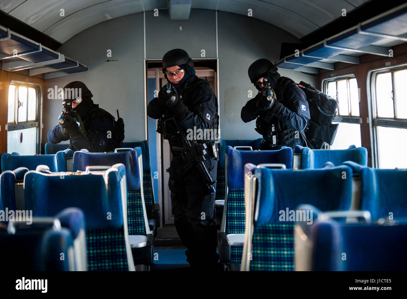 British armed police officers firearms exercise where they storm a ...