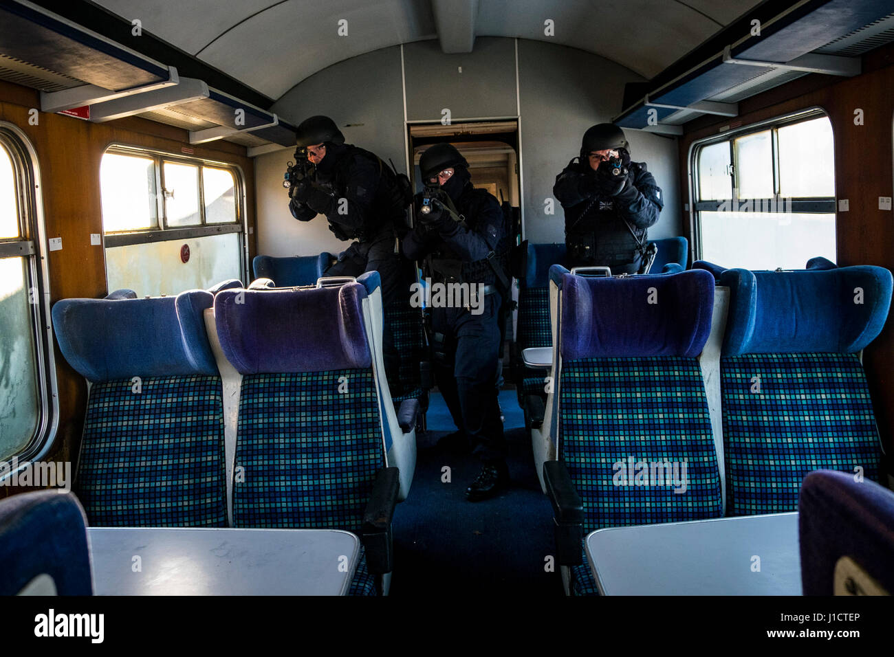 British armed police officers firearms exercise where they storm a ...