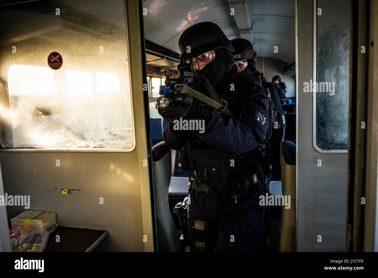 British armed police officers firearms exercise where they storm a ...