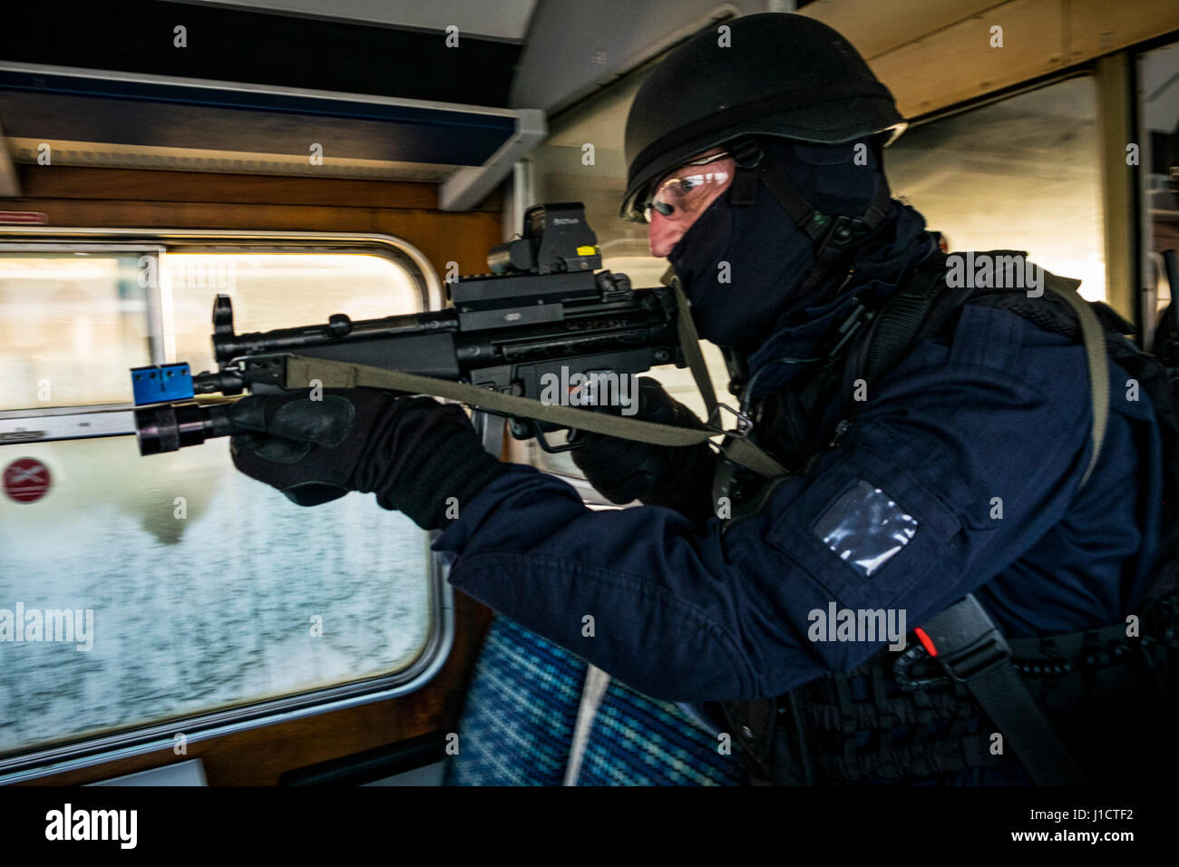 British armed police officers firearms exercise where they storm a ...