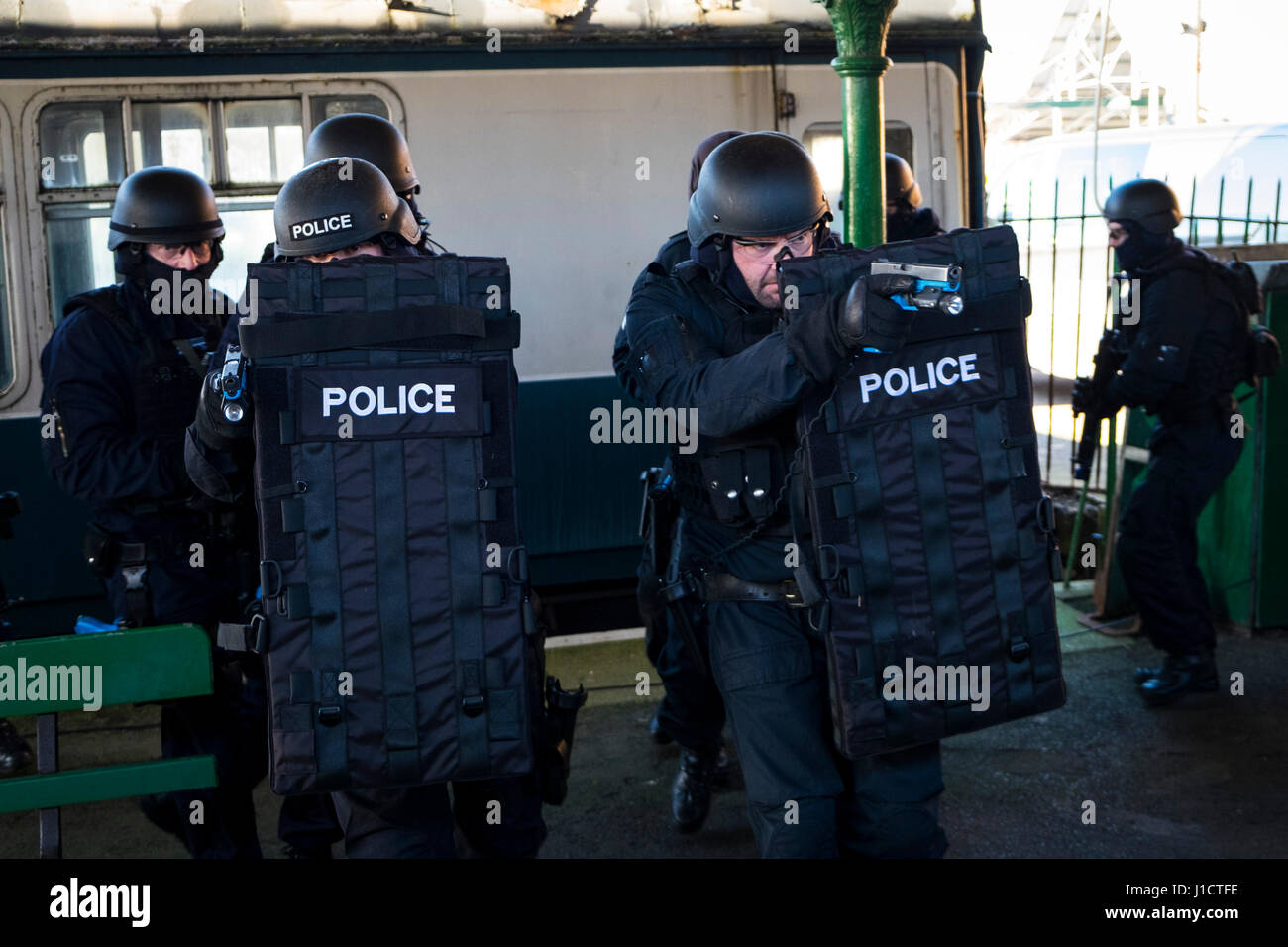 British armed police officers firearms exercise where they storm a ...