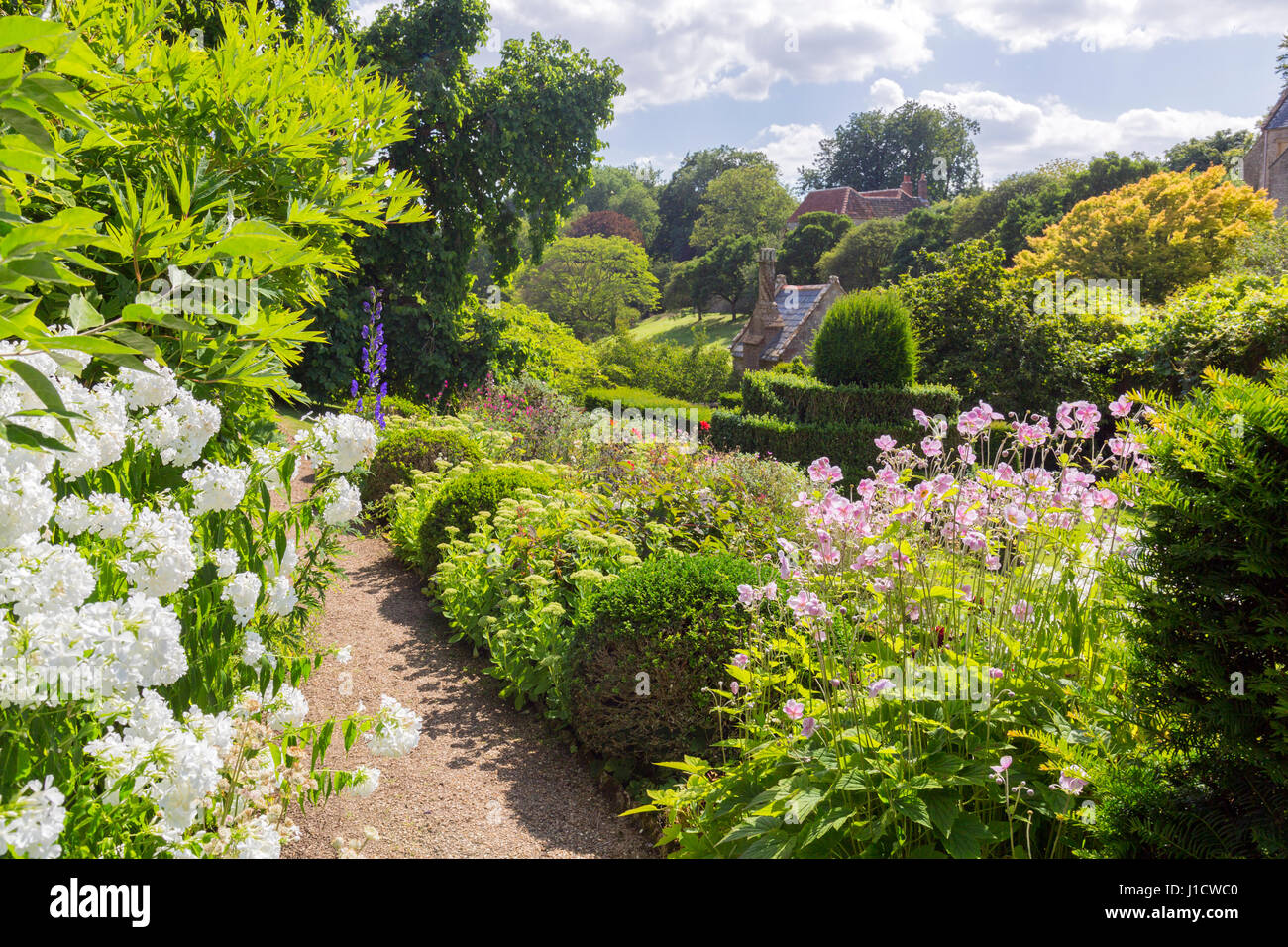One of the colourful herbaceous borders in the sunken Italianate garden ...