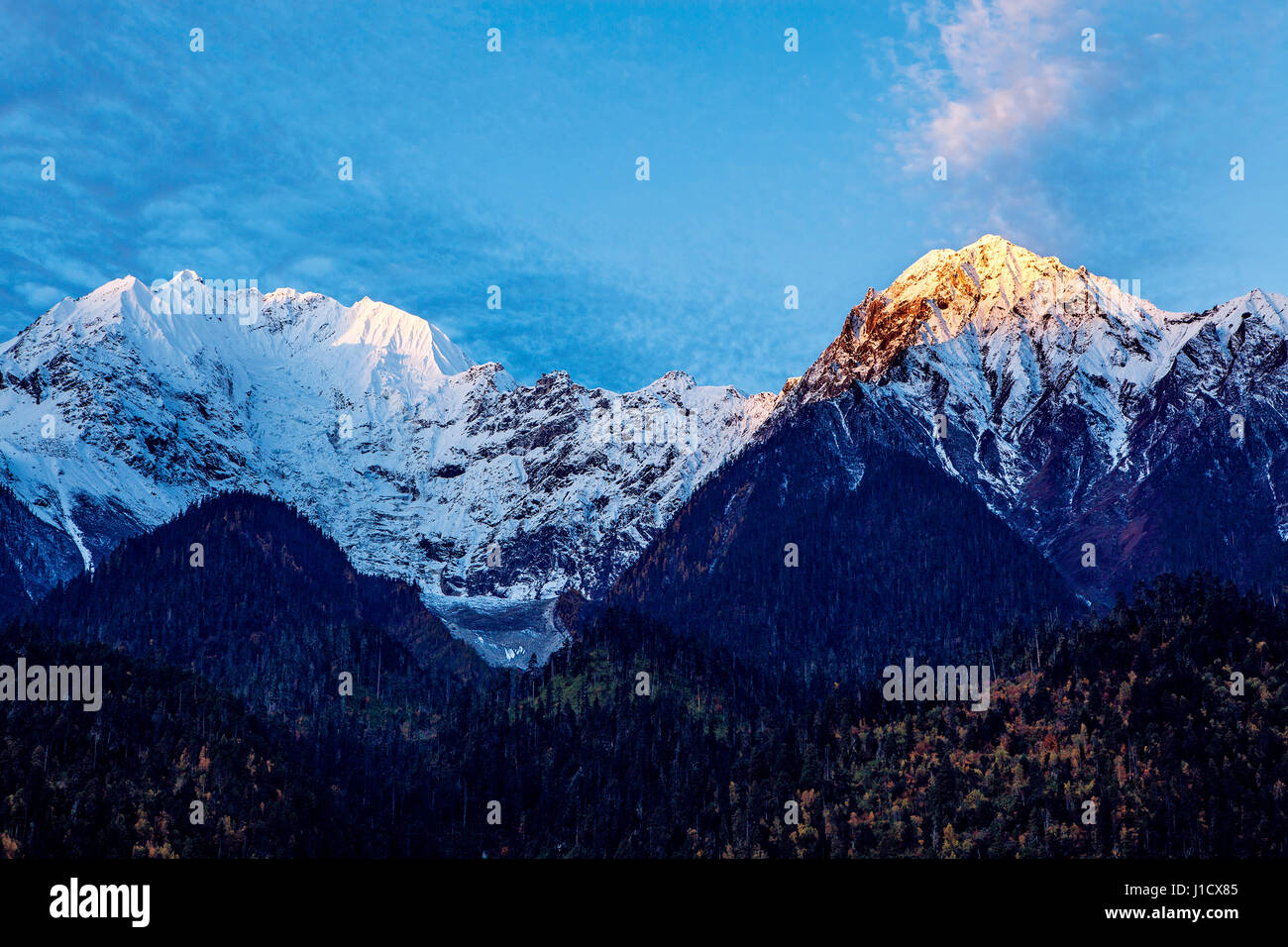 The snow mountains of Bomi County in Tibet Stock Photo - Alamy