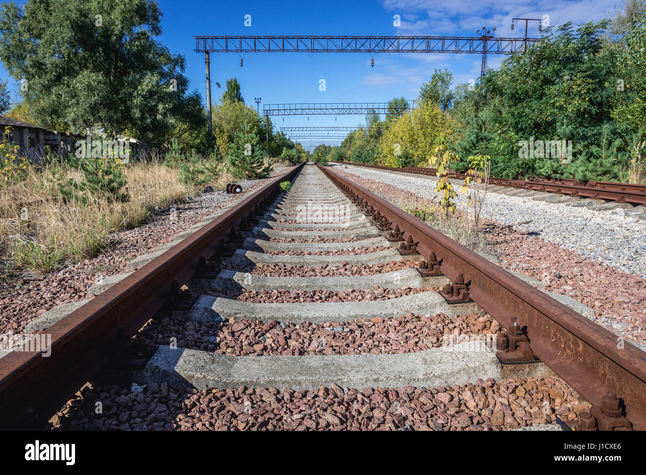 Railway tracks of abandoned Yaniv town railway station, Chernobyl ...